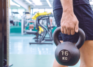 Suitcase Carry Exercise - Benefits, Muscles Worked & Common Mistakes to ...